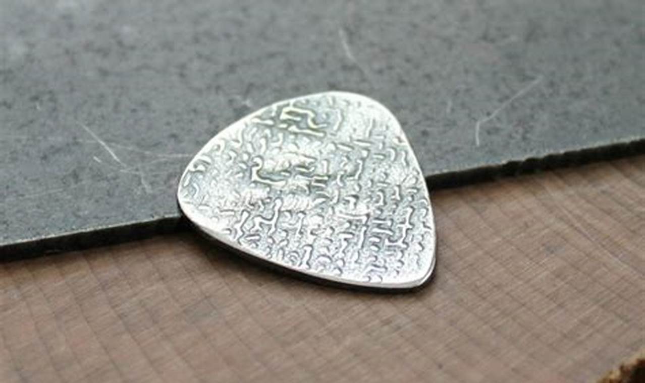 Unveiling the Sonic Secrets: Uncover the Power of Silver Guitar Picks